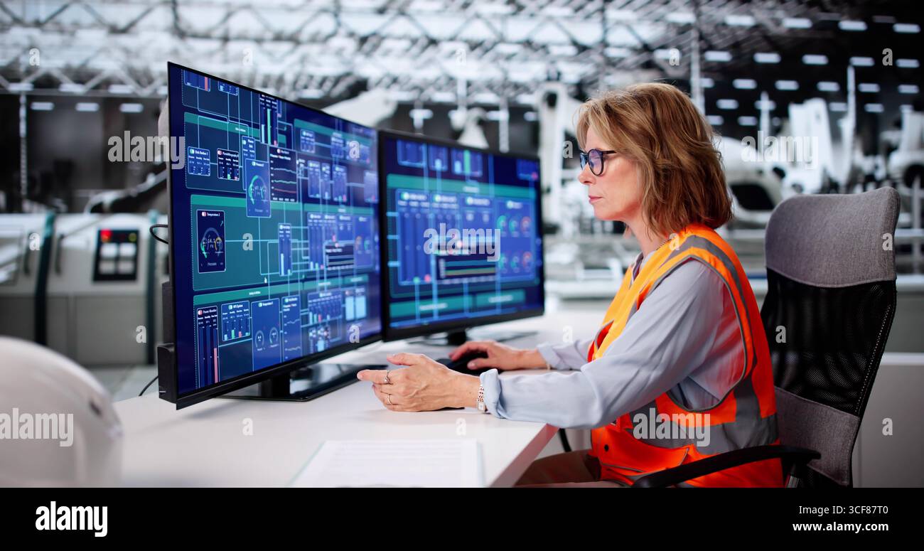 Senior Manufacturing Engineer Monitors SCADA System On Production Line ...