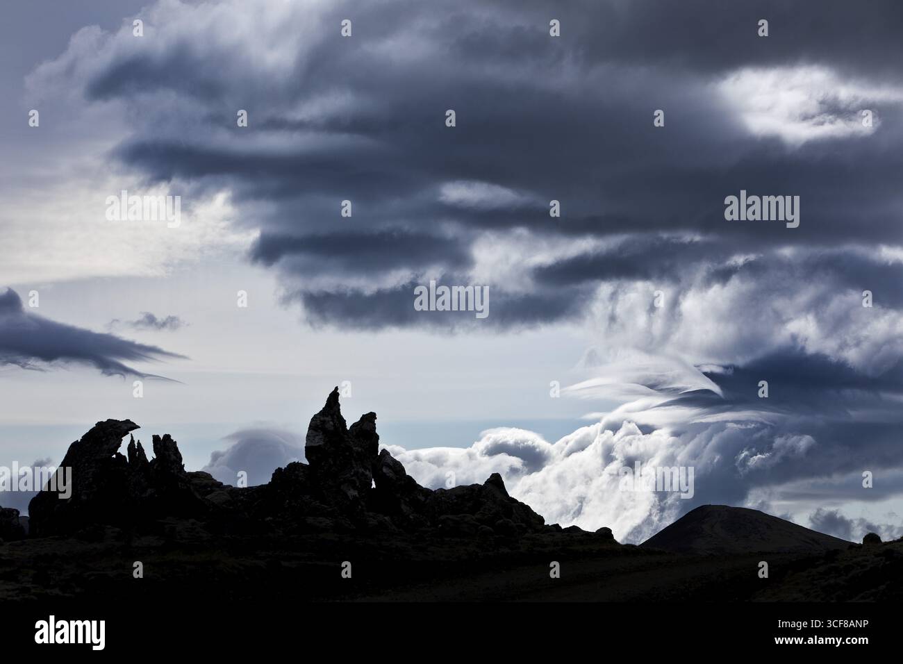 The lava field Berserkjahraun in front of a dramatic sky, appears in ...