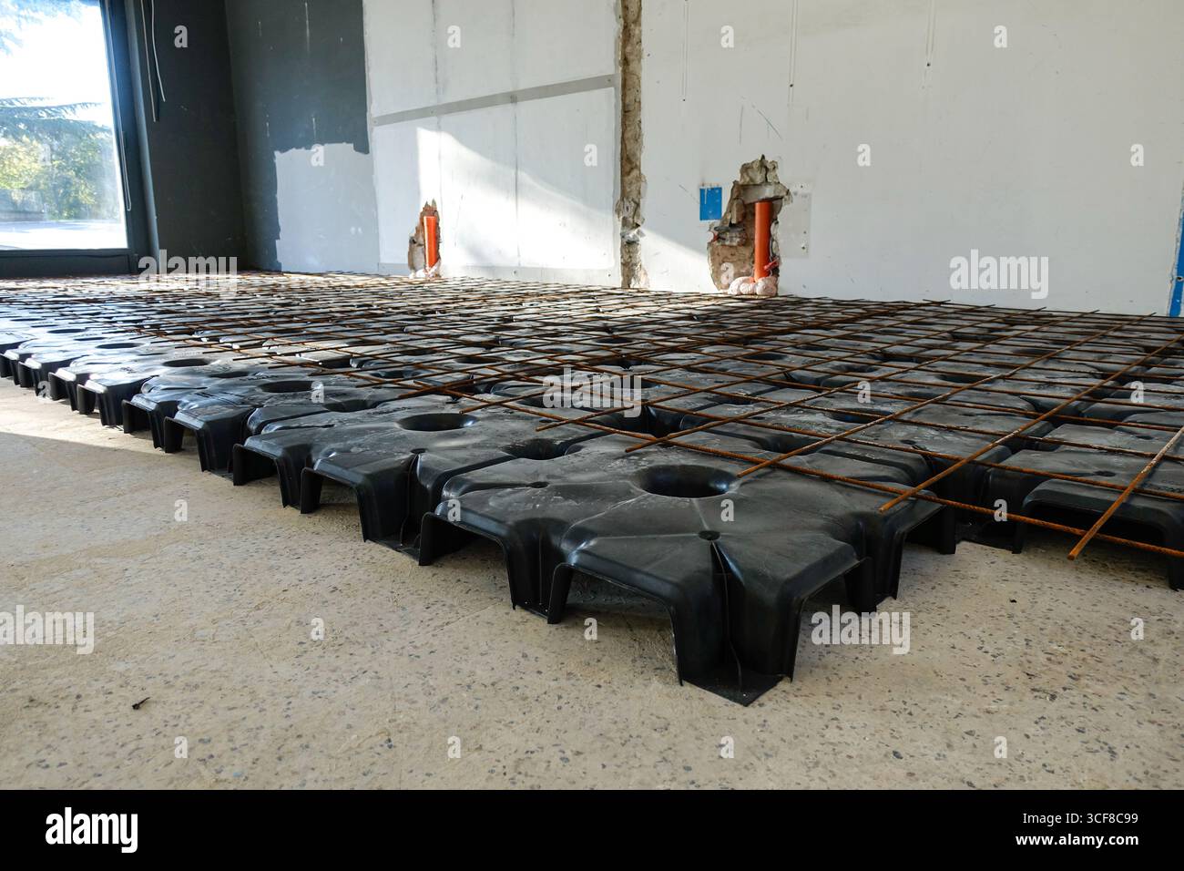 Modern construction site showing reinforced concrete foundation with ...
