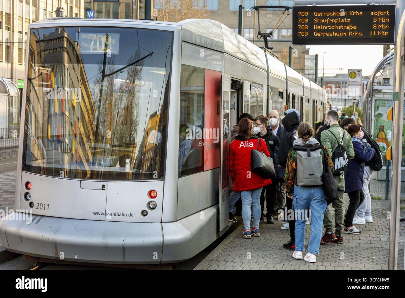 Tram stop Duesseldorf main station in rush hour traffic Stock Photo - Alamy