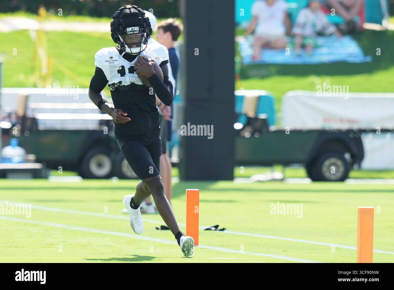 Jacksonville Jaguars wide receiver Travis Hunter, second from right ...