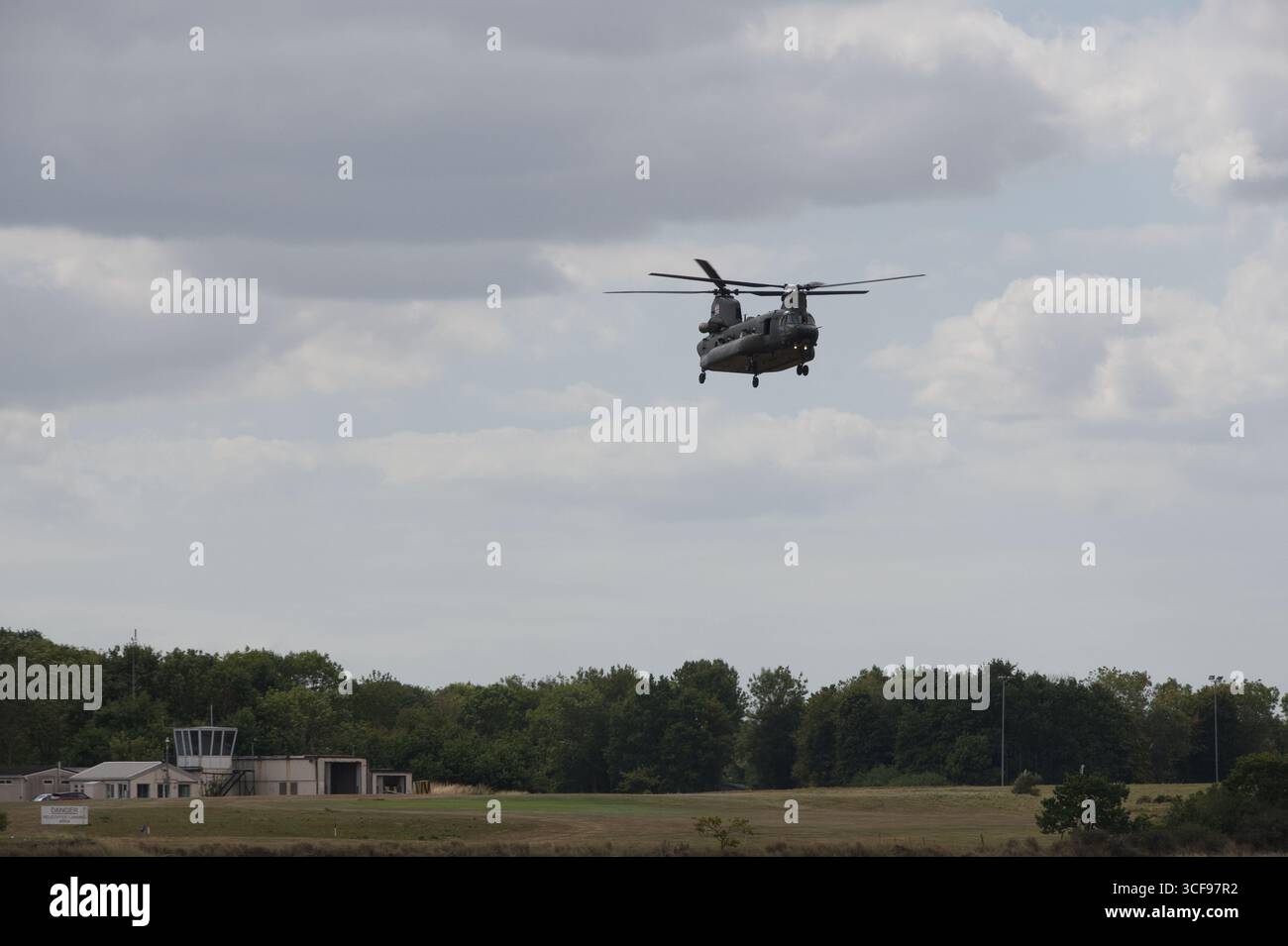 Helicopter flying above trees in hi-res stock photography and images ...
