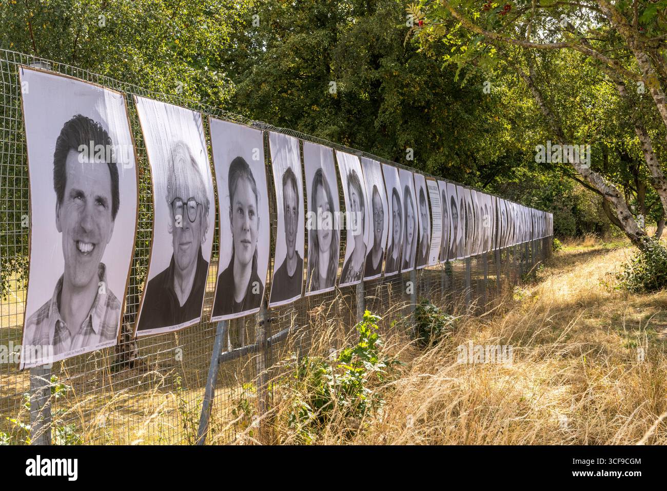 A display of community portraits made by local young people on show in ...