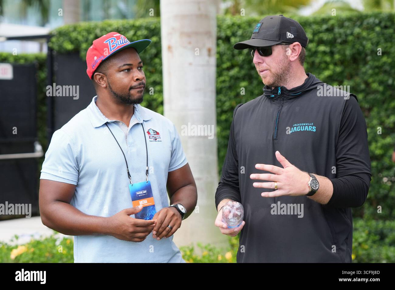 NFL Network reporter Cameron Wolfe, left, talks with Jacksonville ...