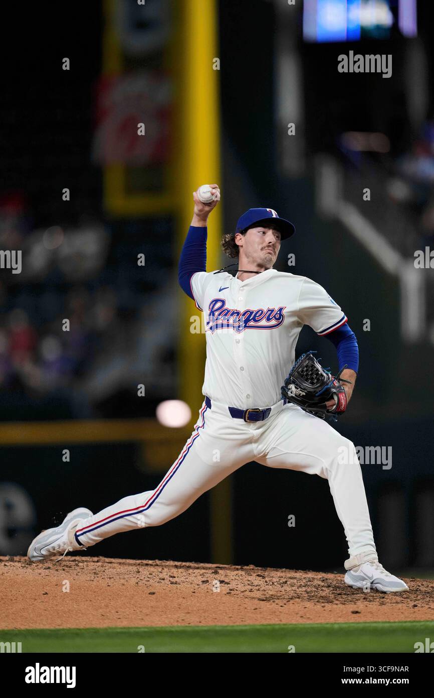 Texas Rangers relief pitcher Cole Winn throws to the Arizona ...