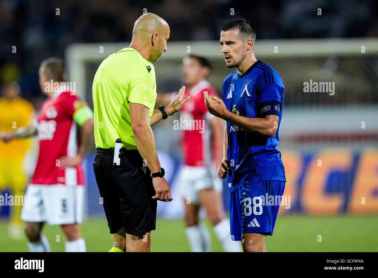SOFIA, BULGARIA - AUGUST 21: referee Tamas Bognar talking Marin Petkov ...