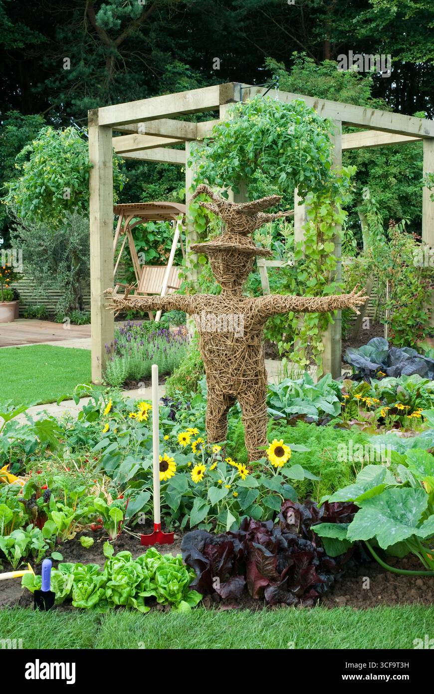 WICKER MAN IN VEGETABLE BORDER, LETTUCE LITTLE GEM, RADDISH CHERRY ...