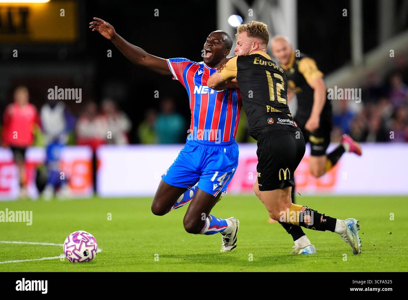 Crystal Palace's Jean-Philippe Mateta (left) and Fredrikstad's Ulrik Fredriksen battle for the ...