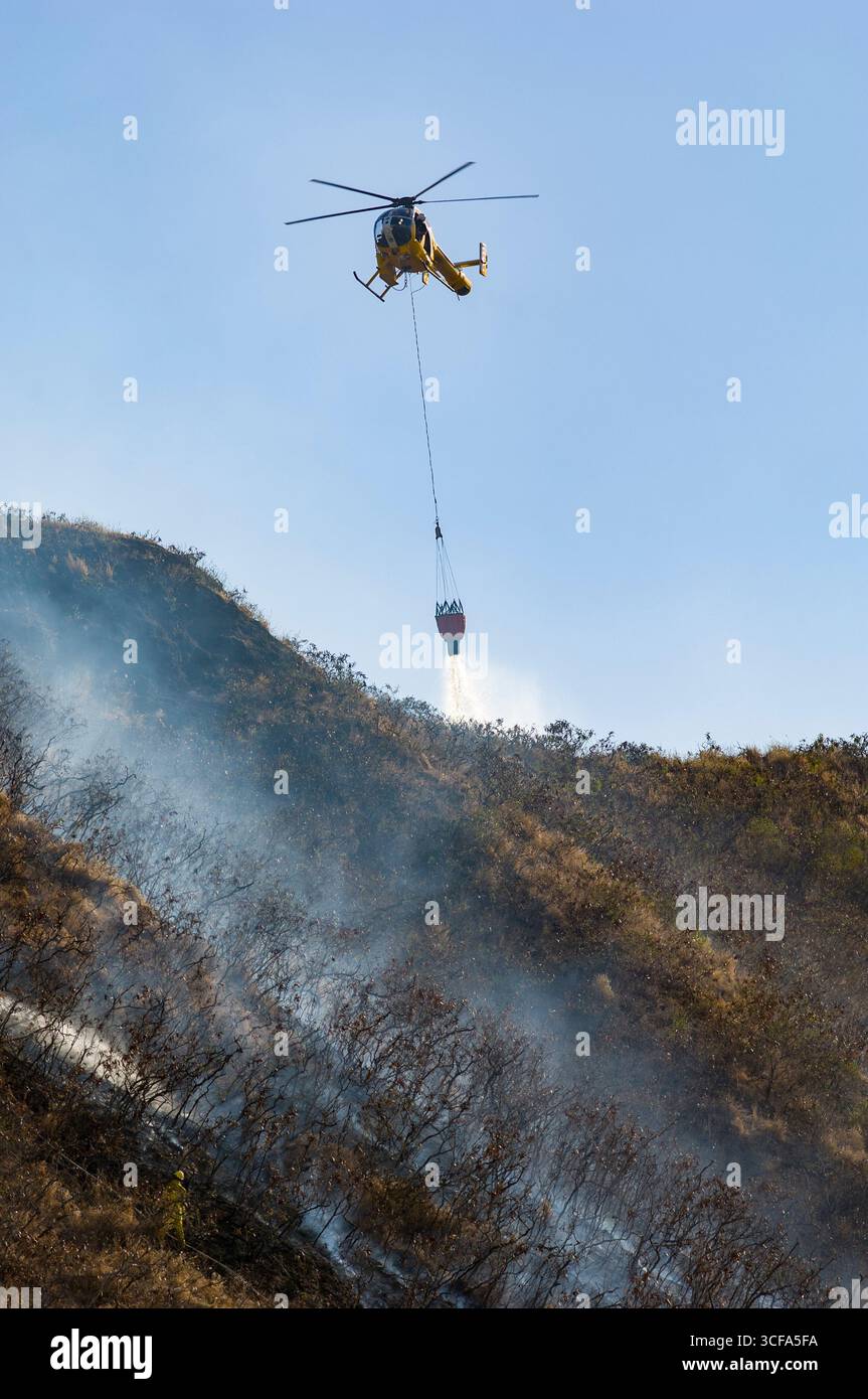 Honolulu Fire Department helicopter MD-520N with long line water bucket ...
