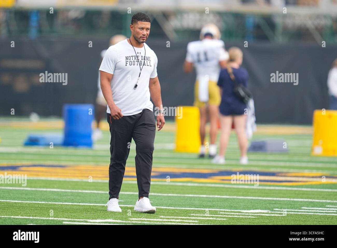 FILE - Notre Dame head coach Marcus Freeman walks between drills during ...