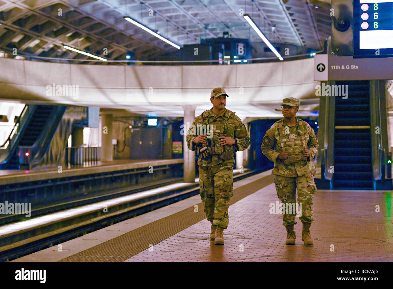 National guard members patrol hi-res stock photography and images - Alamy