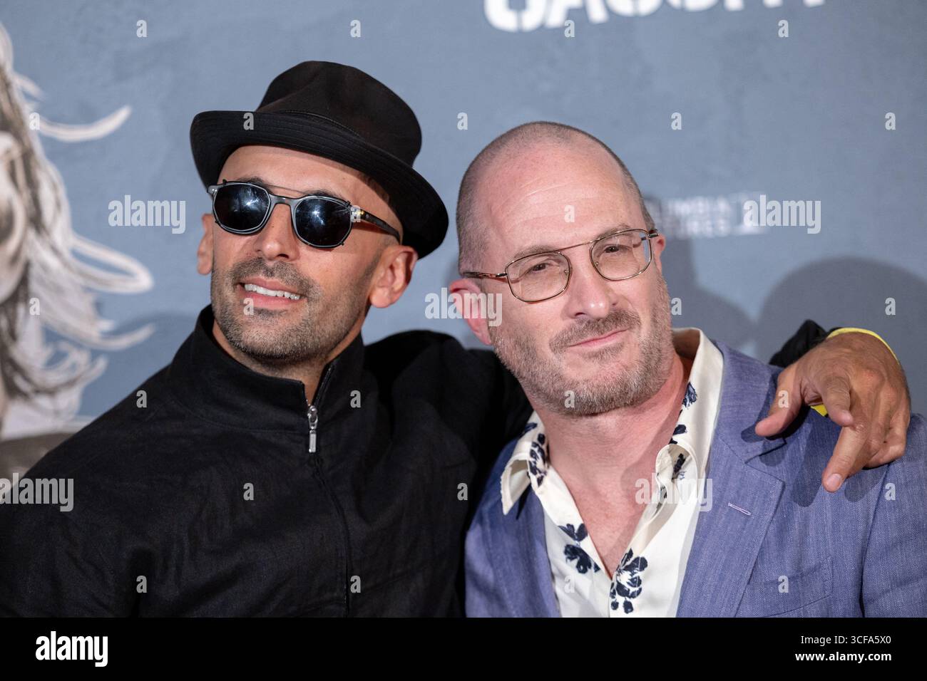 French artist JR and US film director Darren Aronofsky poses during the ...