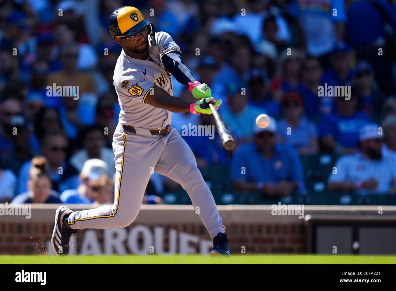Milwaukee Brewers' Andruw Monasterio hits a single during the eighth ...