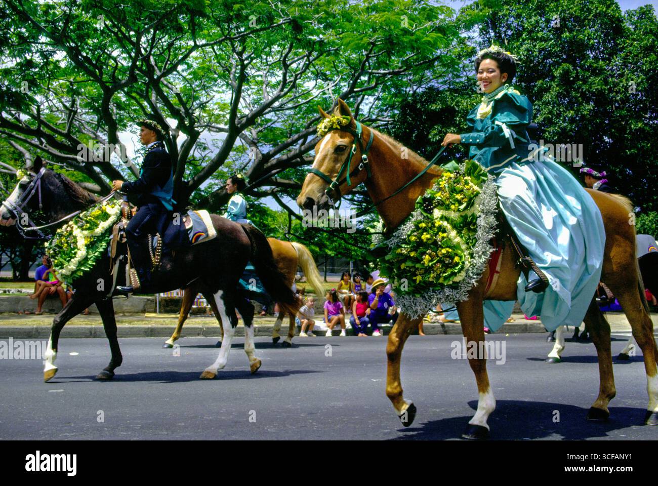 Male and female Hawaiian Pa'u riders on horseback during the King ...