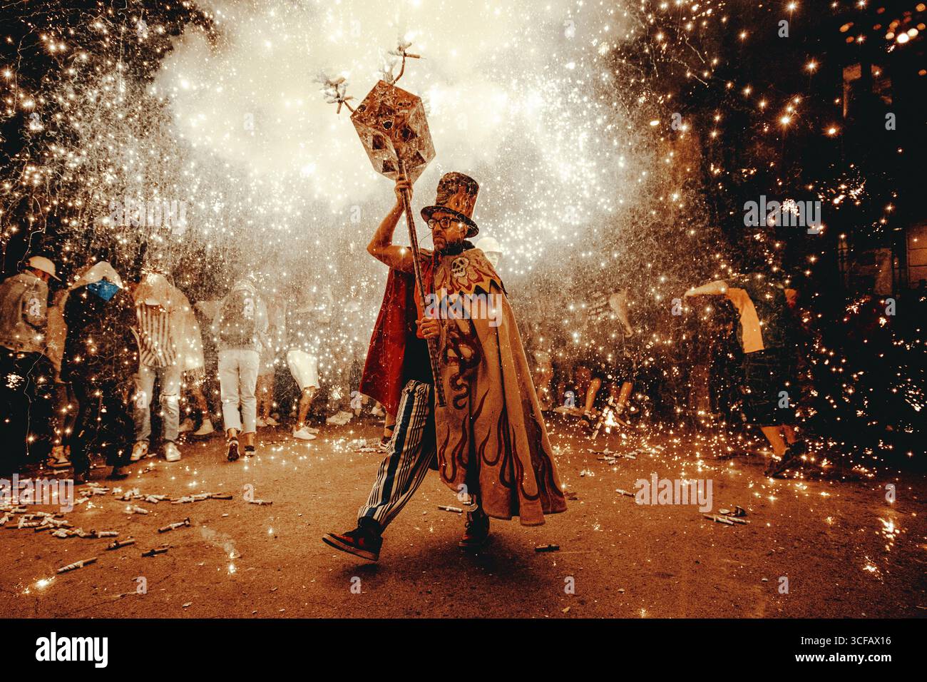 Barcelona, Spain. 21 August, 2025: Fire runners in devil costumes ...