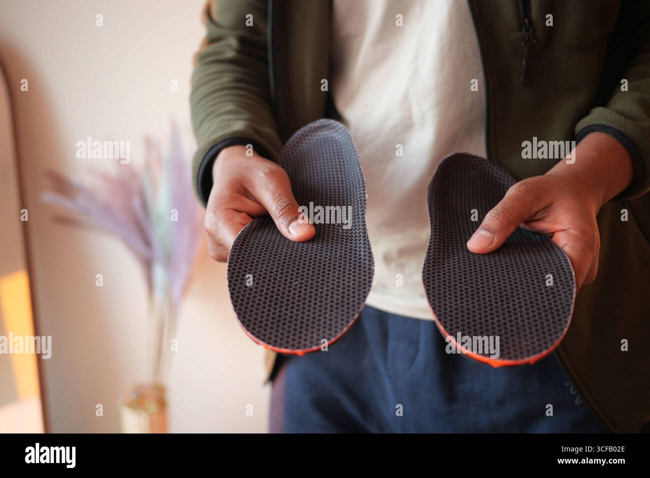 Choosing the right insoles for comfort and support Stock Photo - Alamy