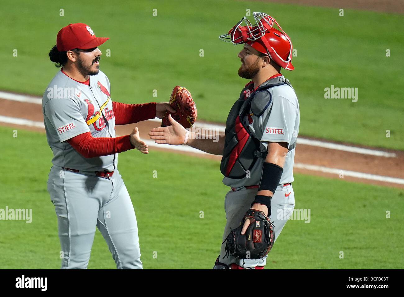 St. Louis Cardinals pitcher JoJo Romero, left, and catcher Pedro Pagés ...