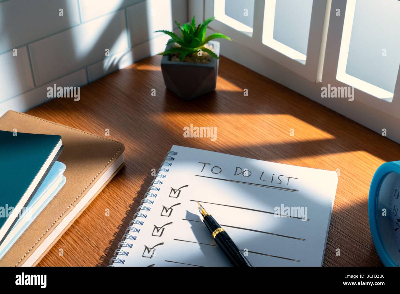 A notebook with "TO DO LIST" written on it. Productivity, time ...