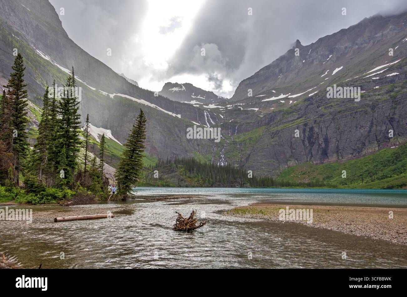 Grinnell Lake at Glacier National Park, Montana in June Stock Photo - Alamy
