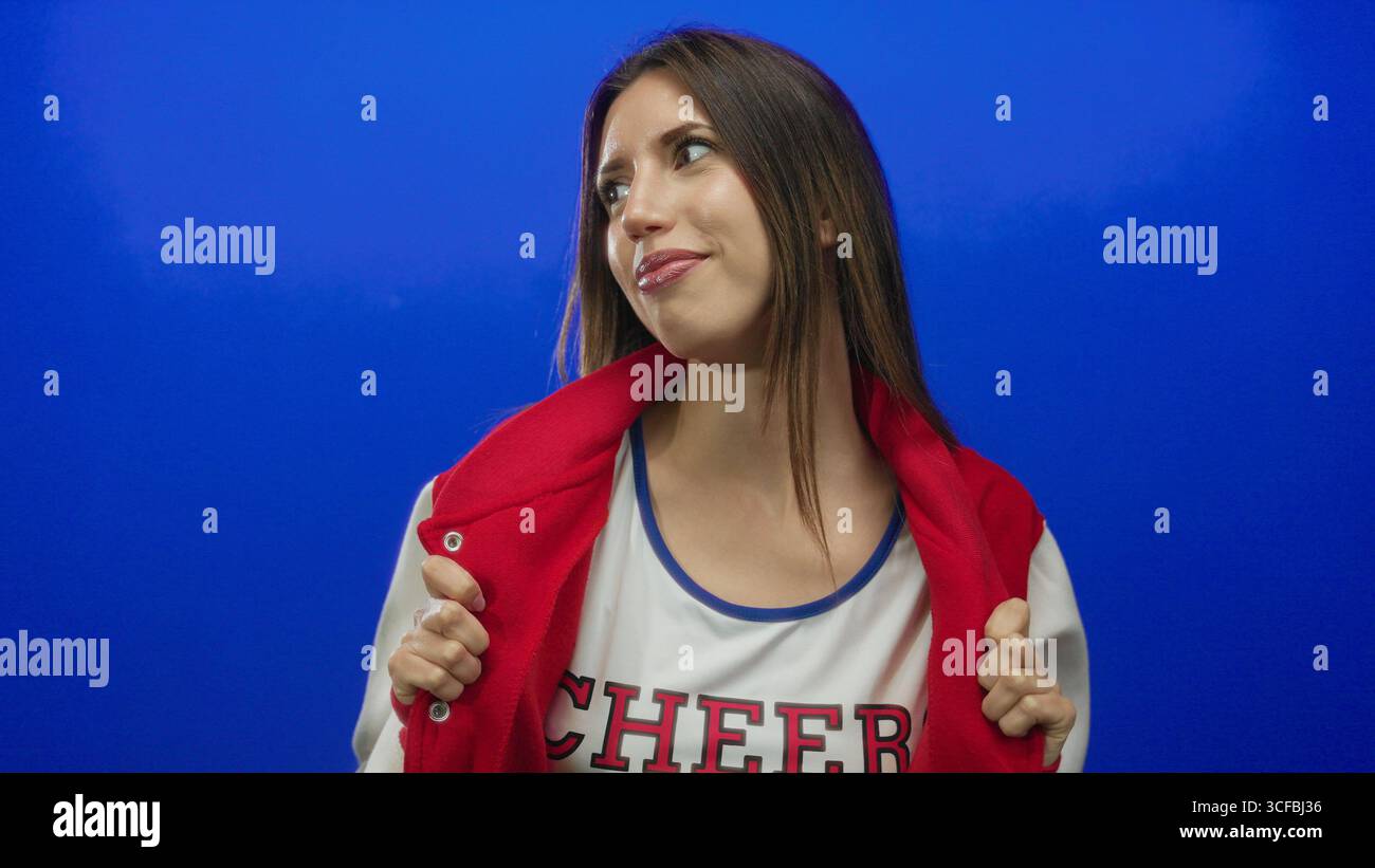 Cheerleader in red varsity uniform hi-res stock photography and images ...