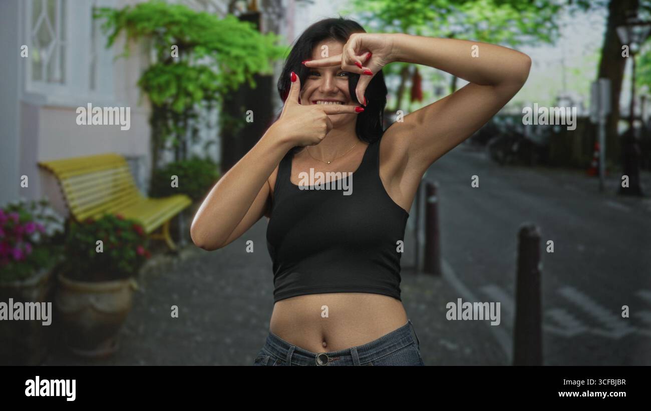 Woman in black crop top hi-res stock photography and images - Alamy