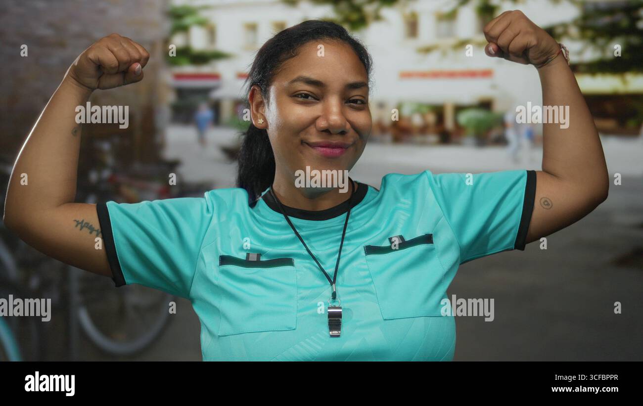 Female referee wearing turquoise uniform hi-res stock photography and ...