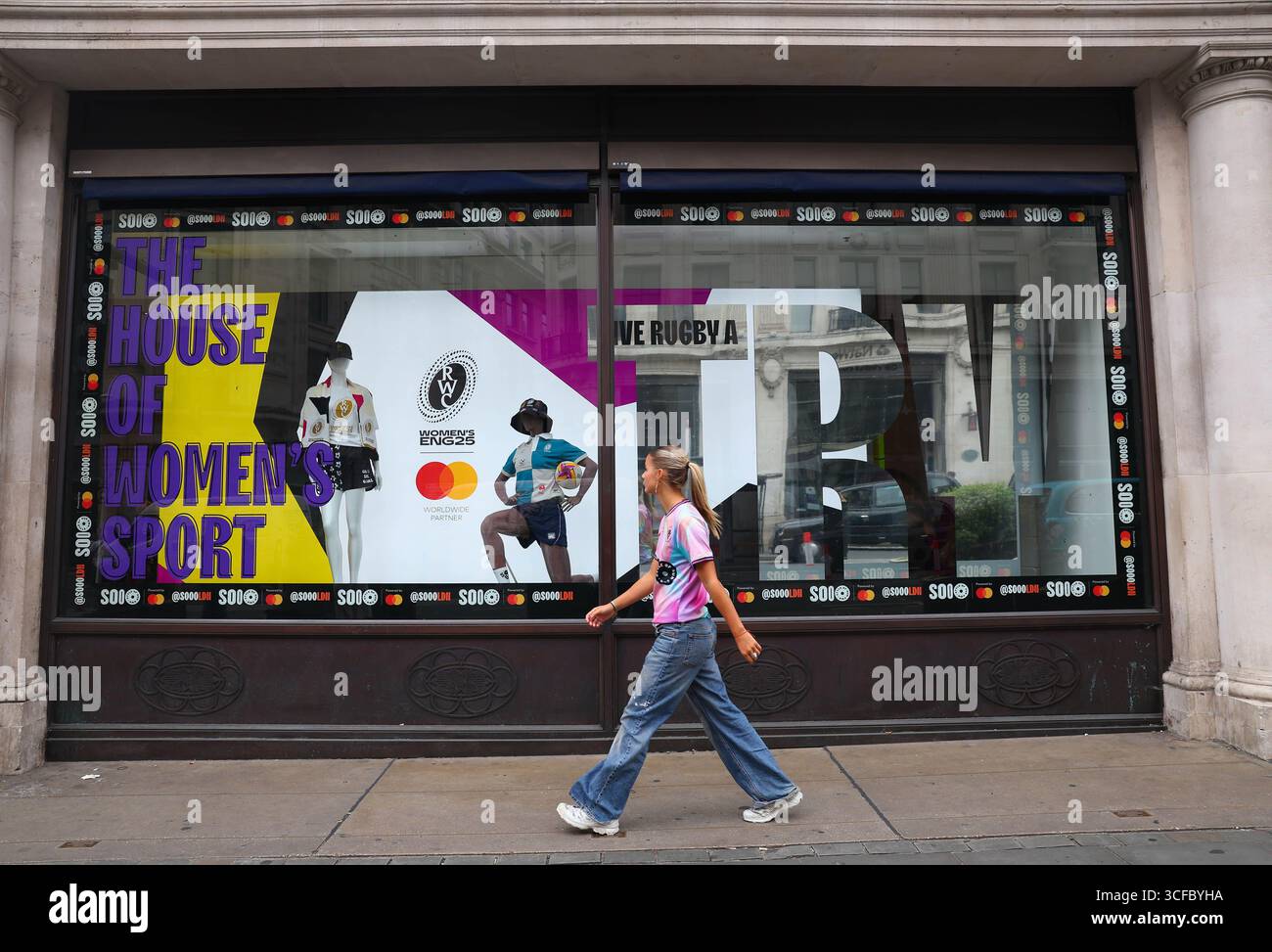 EDITORIAL USE ONLY A woman walks past the 'Style of Our Own' pop-up ...