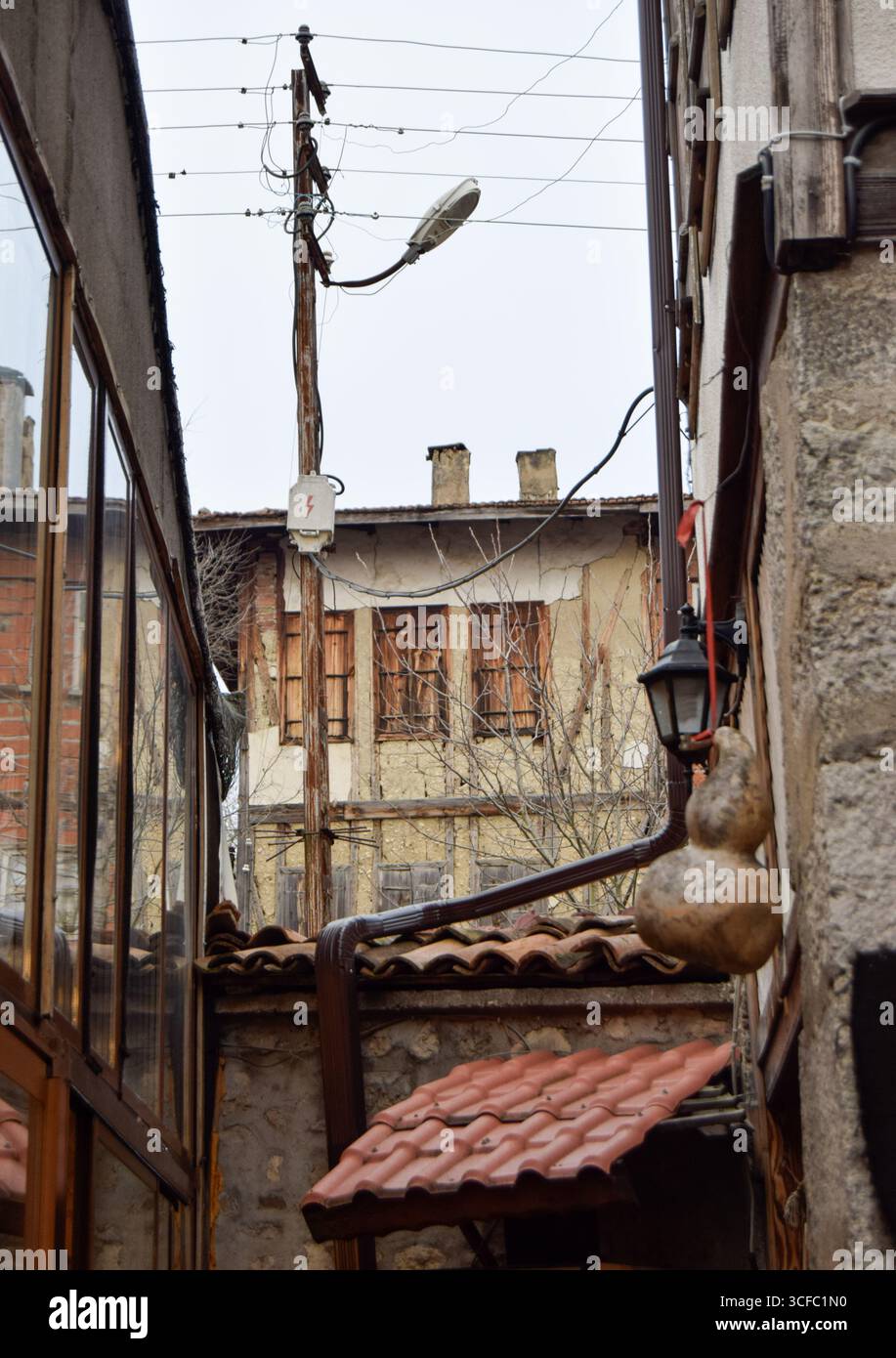 View of aged buildings and narrow alleyways creating a sense of depth ...