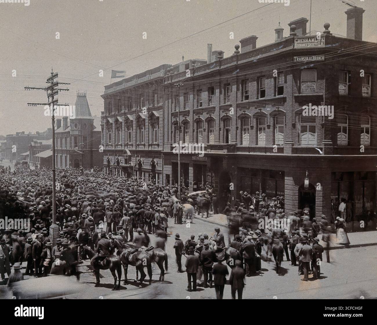 South Africa: a crowd of people gathered outside The Goldfields offices ...