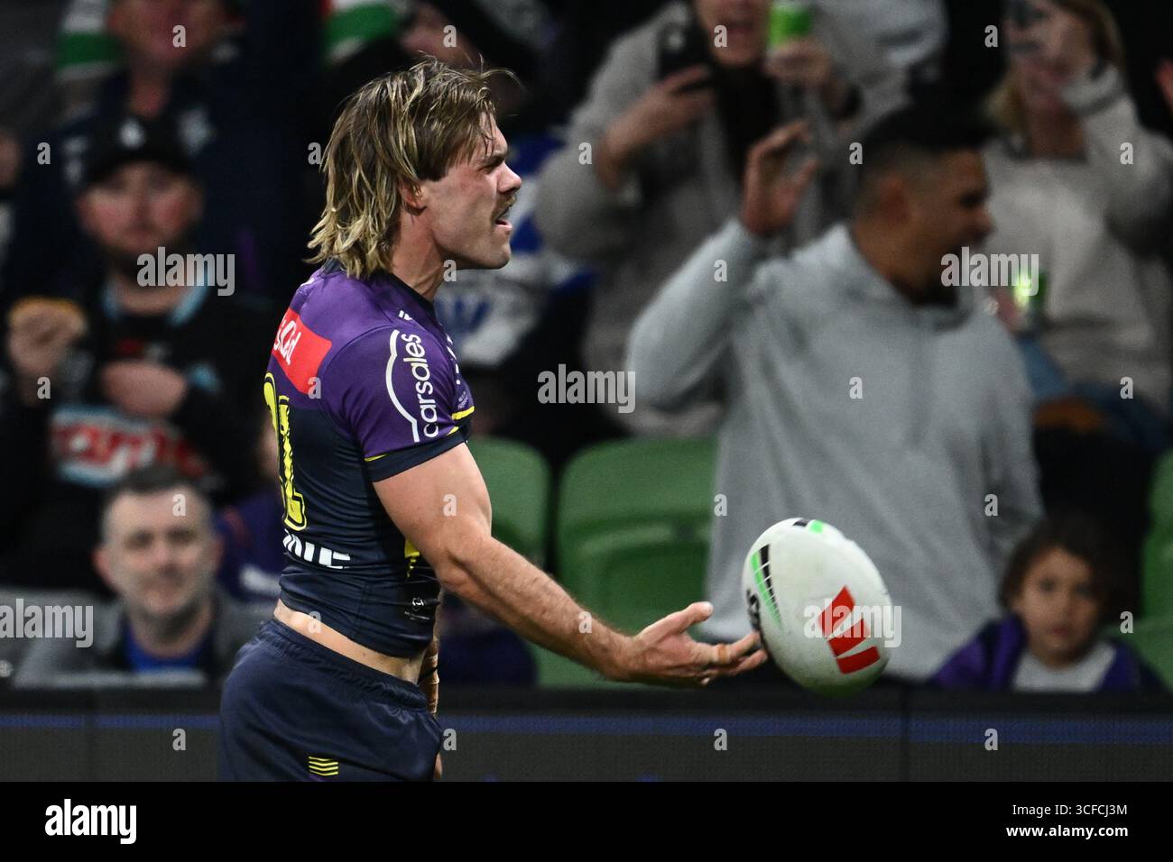 Ryan Papenhuyzen of the Storm celebrates scoring a try during the NRL ...
