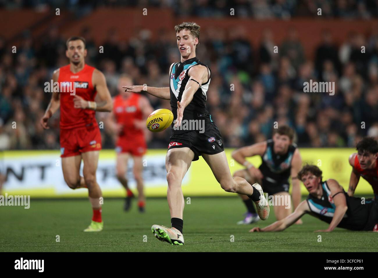 Jack Whitlock of the Power kicks a goal during the AFL Round 24 match between the Port Adelaide ...
