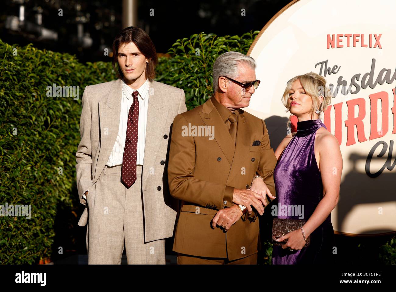 Dylan Brosnan, from left, Pierce Brosnan and Isabella Smith pose for photographers upon arrival ...