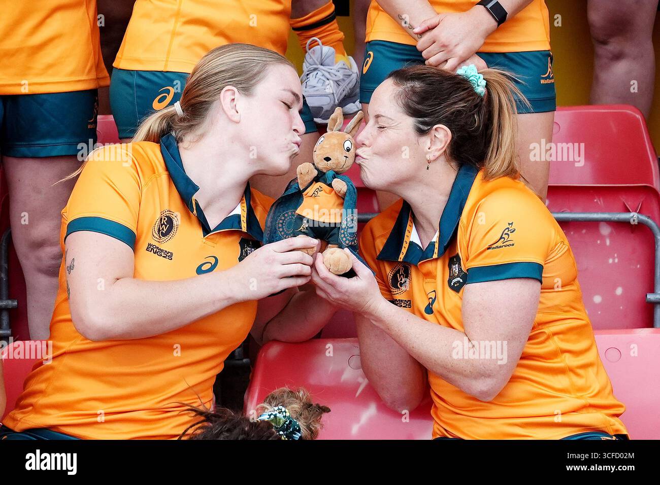 Emily Chancellor (right) and Kaitlan Leaney pose with their Wallaby ...