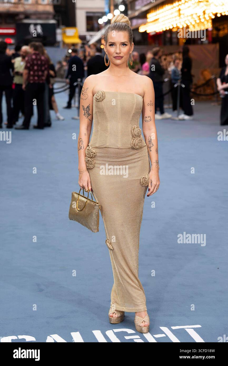 Lottie Moss poses for photographers upon arrival at the screening of ...
