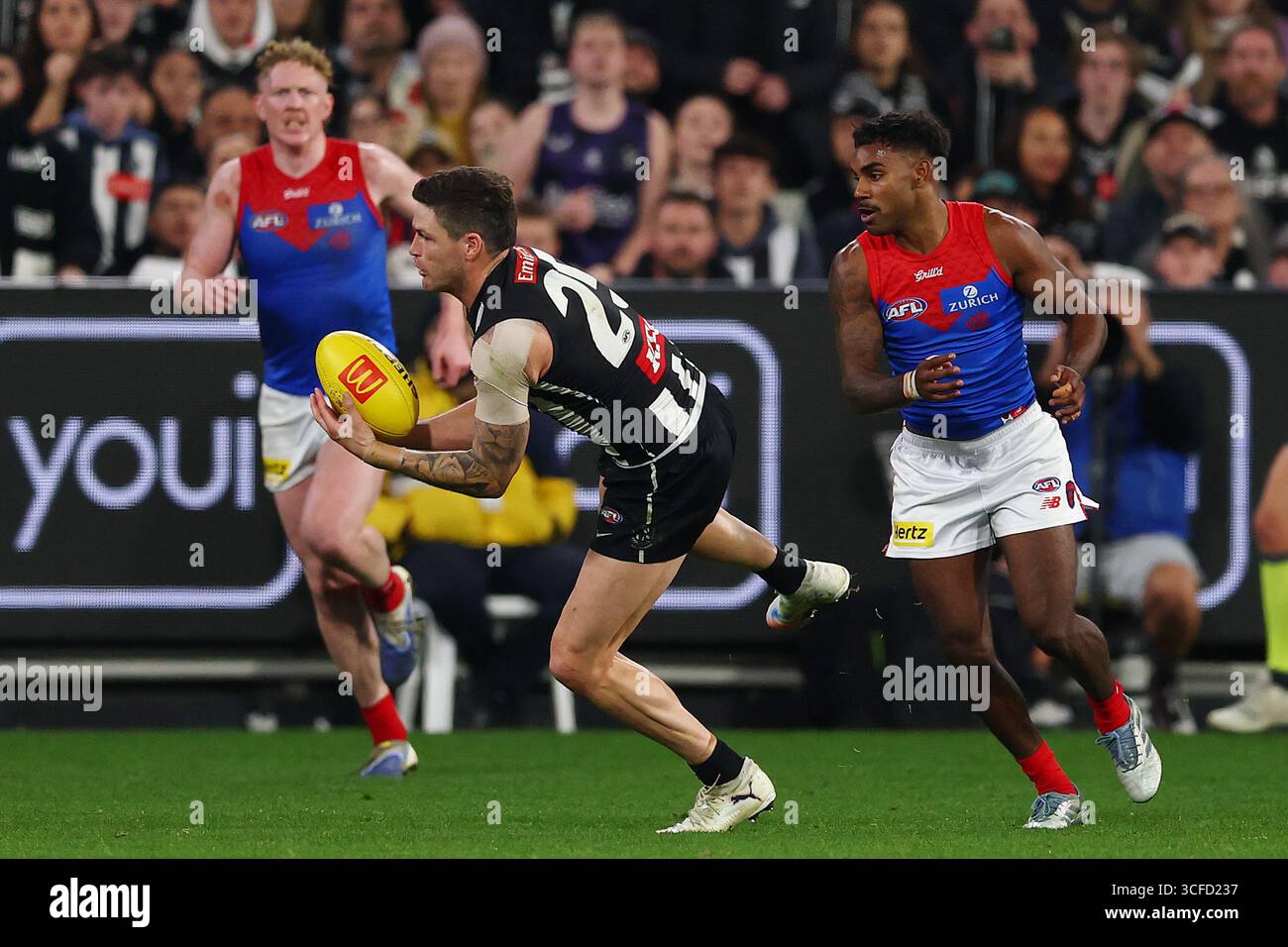 Jack Crisp of the Magpies marks the ball during the AFL Round 24 match ...