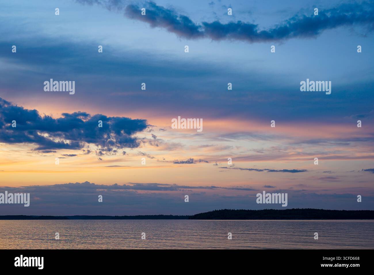 Serene evening lake scene dramatic hi-res stock photography and images ...