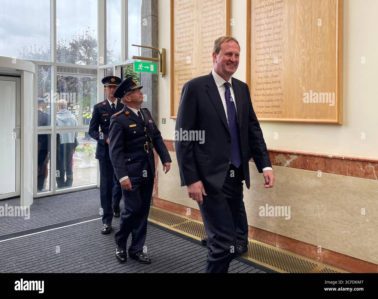 Justice Minister Jim O'Callaghan (right) attends the graduation ...