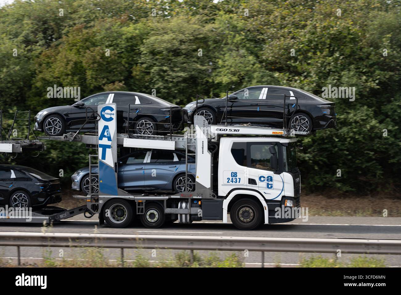 Groupe CAT car transporter on the M40 motorway, Warwickshire, UK Stock ...