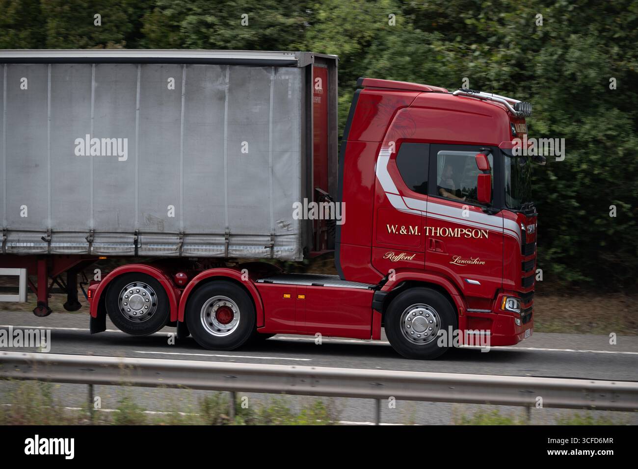 W&M Thompson Scania lorry on the M40 motorway, Warwickshire, UK Stock ...