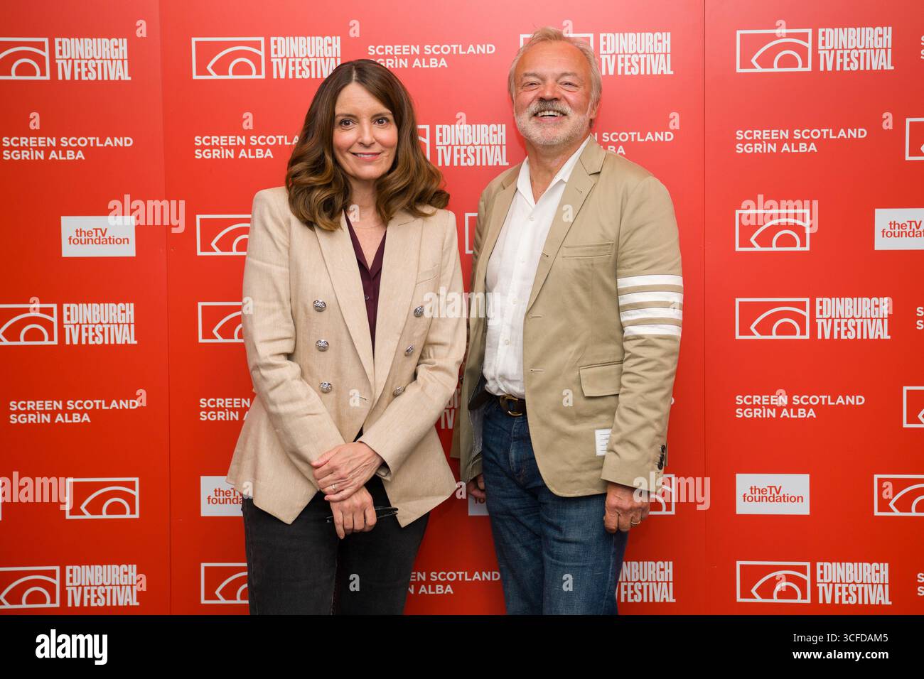 American comedian, writer and producer Tina Fey with presenter Graham ...