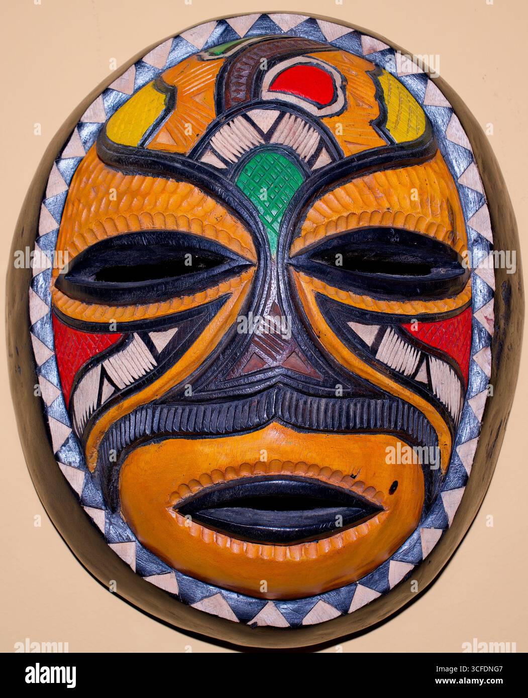 Close-up of a traditional South African mask with vivid colors ...