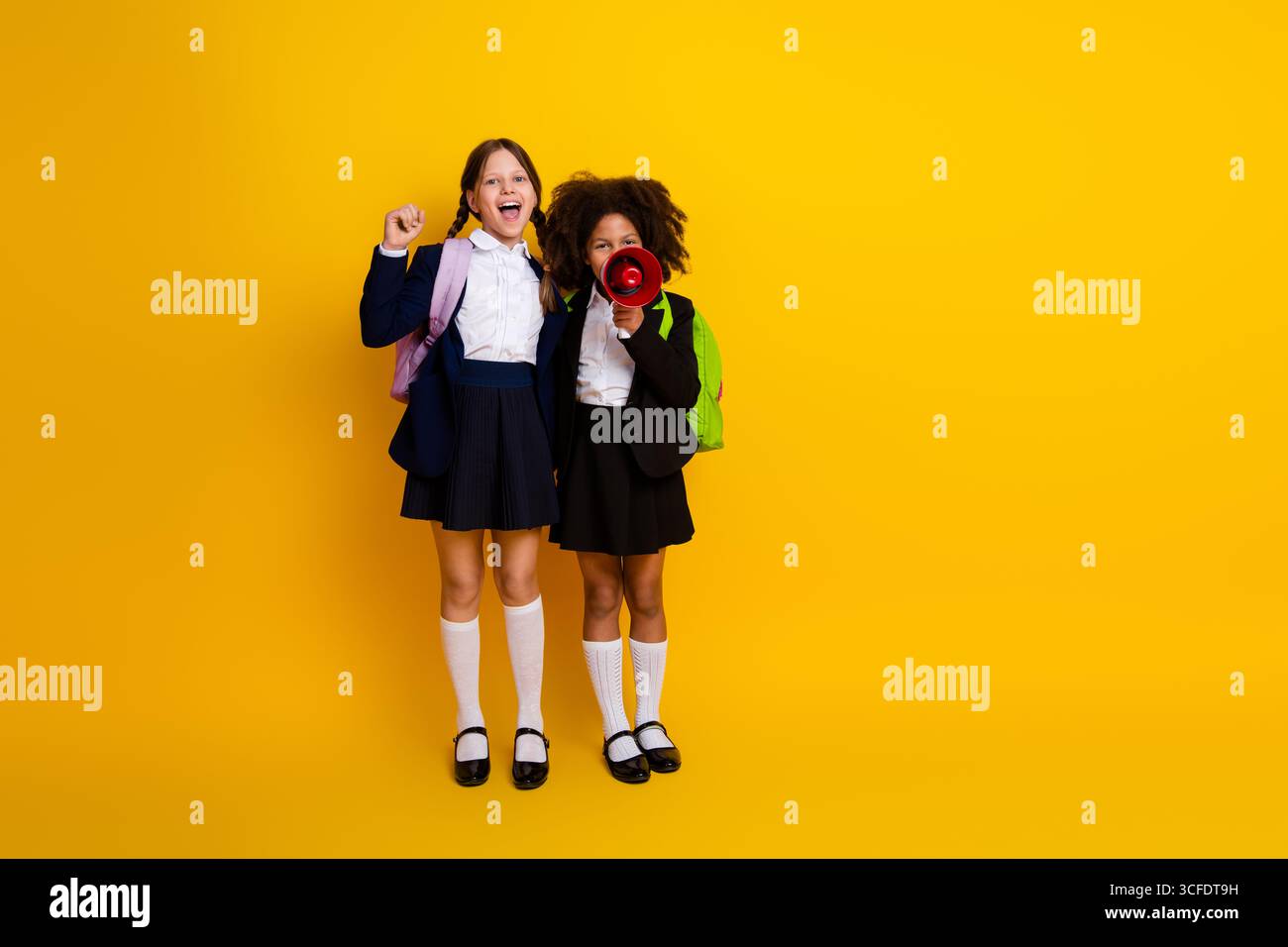 Two schoolgirls in uniforms hi-res stock photography and images - Alamy