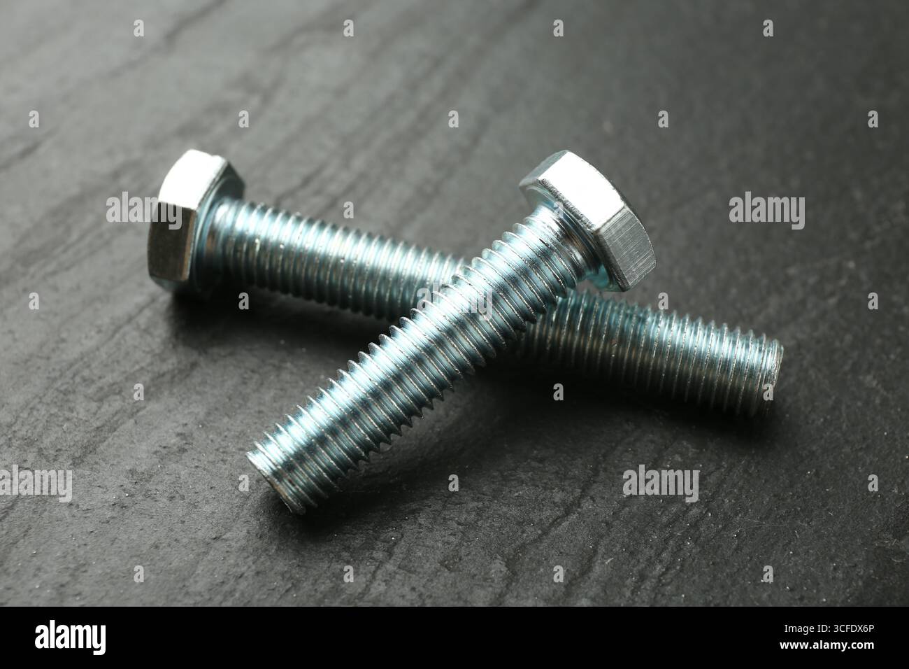 Two black metal bolts hi-res stock photography and images - Alamy