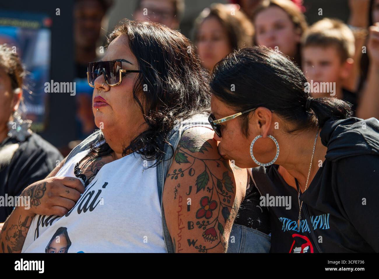 Holly Roy, left, is comforted at an anti-gun violence rally in the wake ...