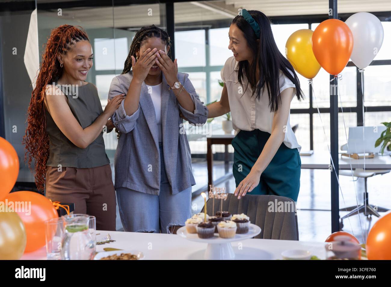 Diverse female coworkers guiding hi-res stock photography and images ...