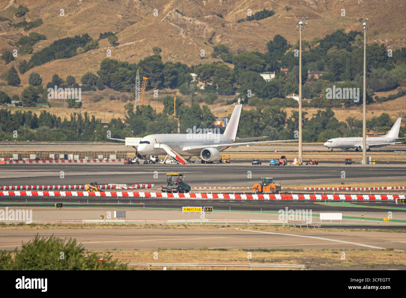 Aerial view of multiple aircraft circling Runway intersections like an ...