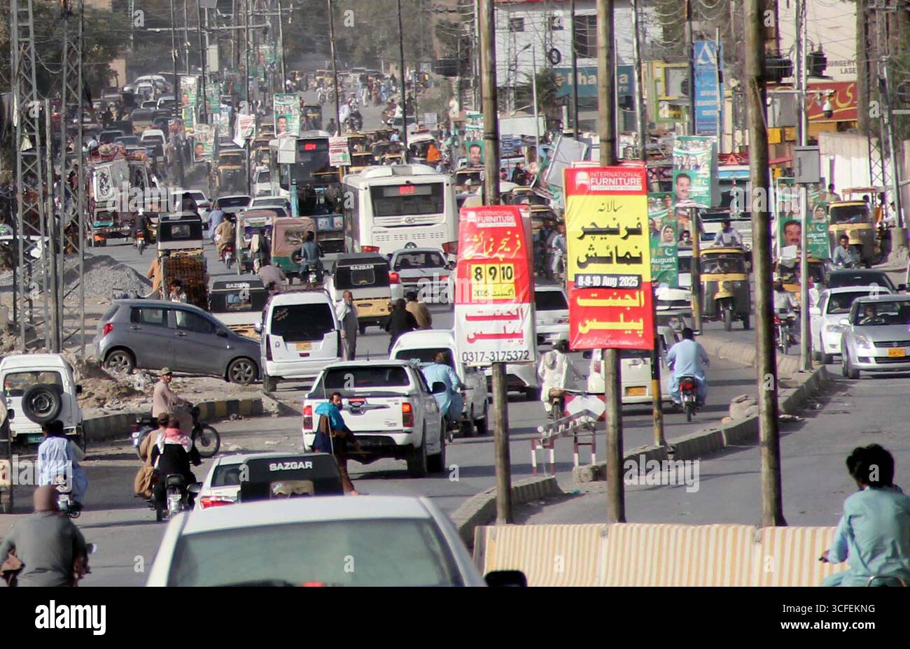 QUETTA, PAKISTAN, AUG 22: A large numbers of vehicles stuck in traffic ...