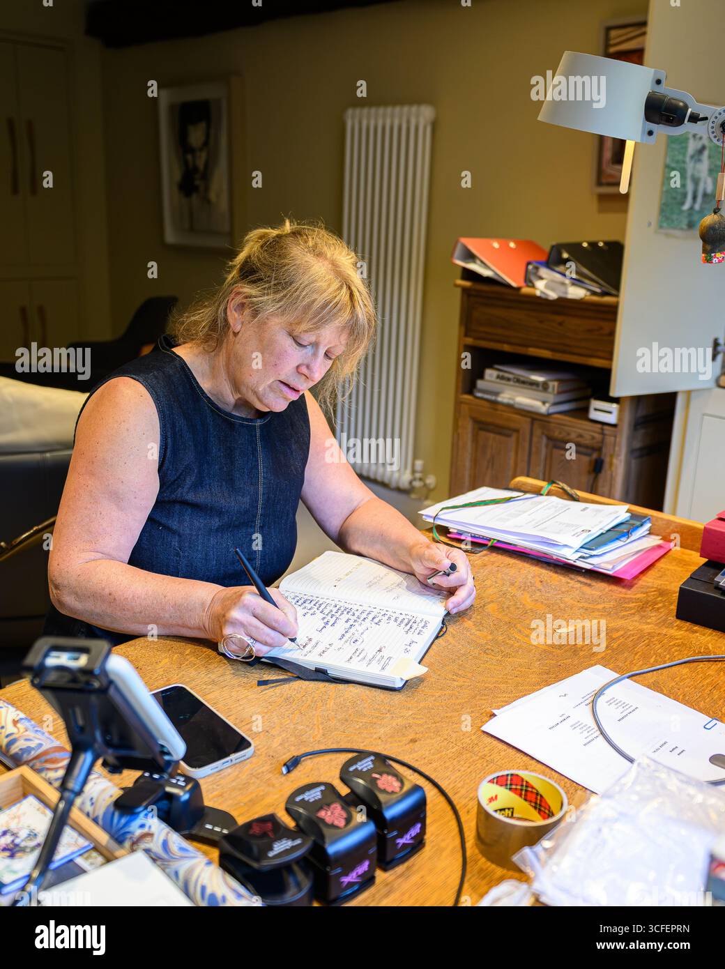 Woman working in office list hi-res stock photography and images - Alamy