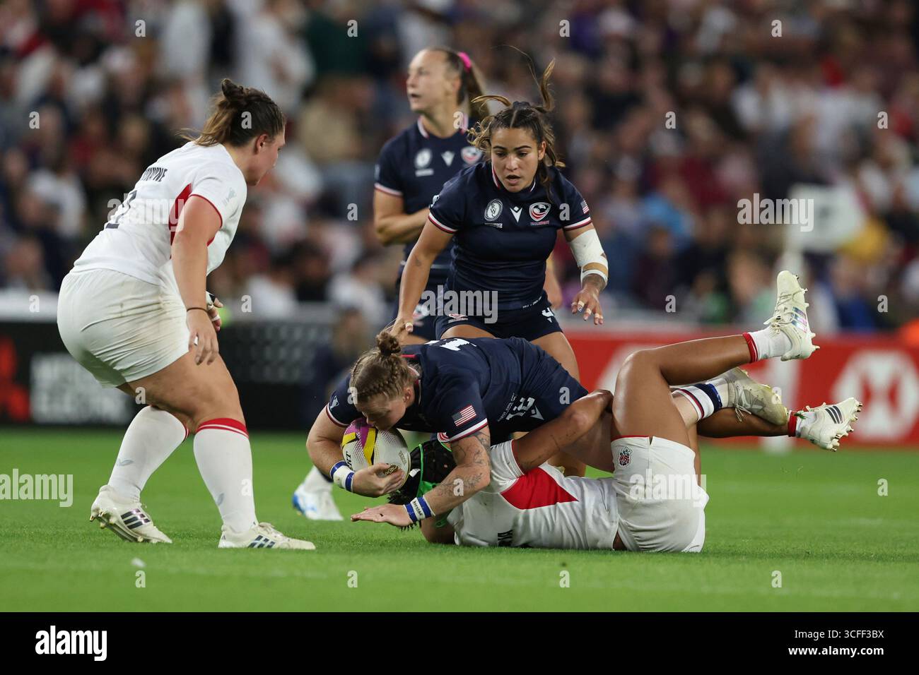 Bulou Mataitoga of the United States is tackled by Sadia Kabeya of ...