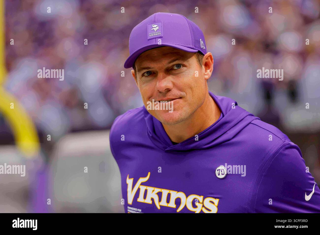 Minnesota Vikings head coach Kevin O'Connell walks onto the field ...